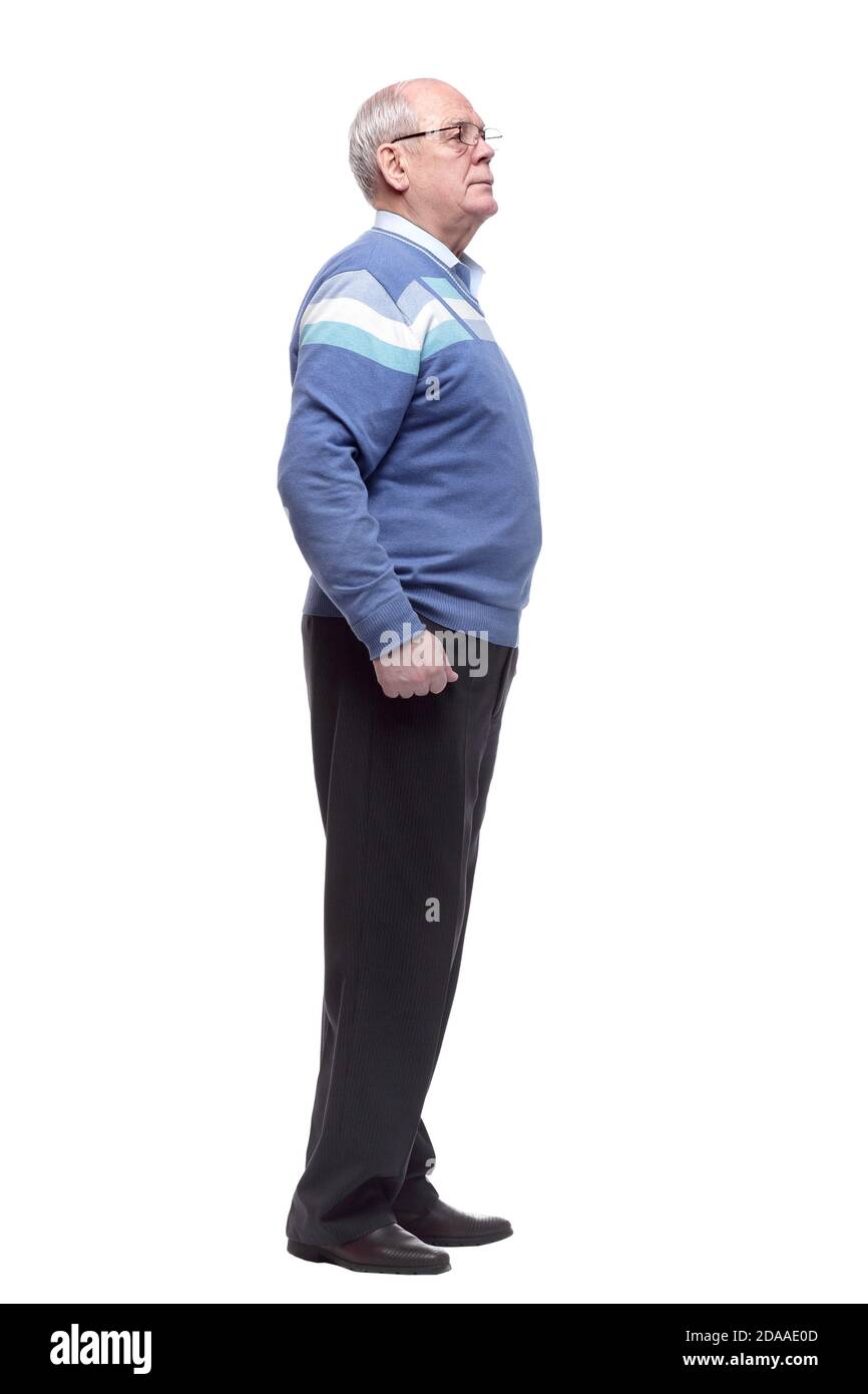 side view. senior man in a jumper looking at a white screen Stock Photo ...