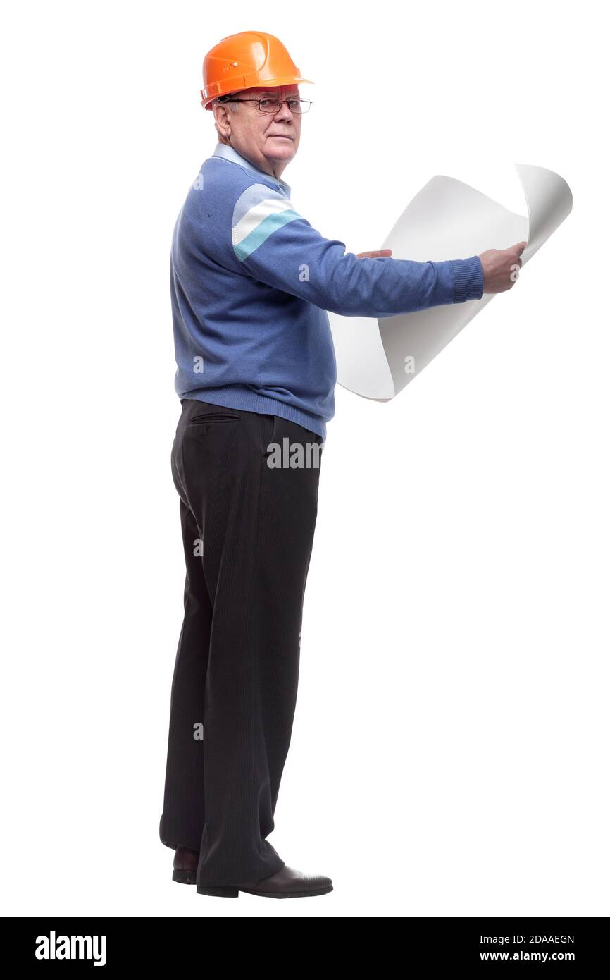 side view. senior engineer carefully reading the drawings Stock Photo ...