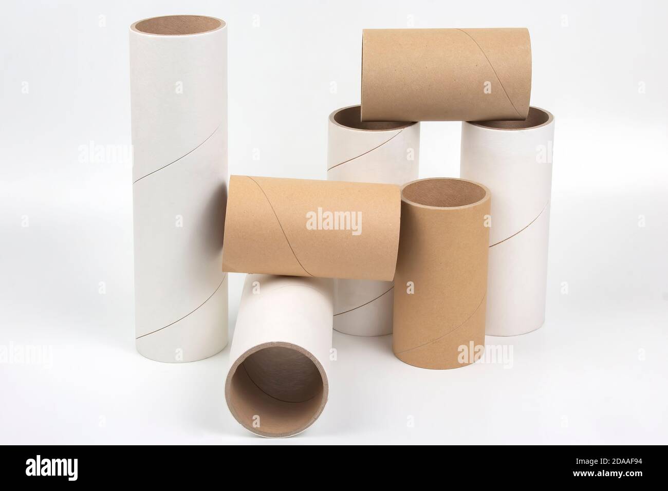 cardboard and paper tubes and pipes on a white background Stock Photo ...