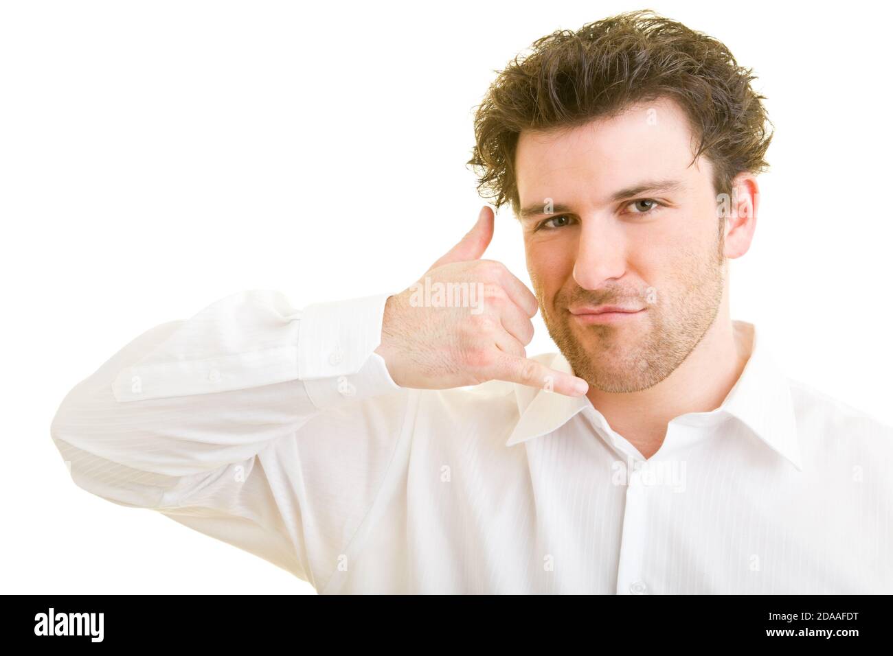 Young man shows a phone call gesture Stock Photo - Alamy
