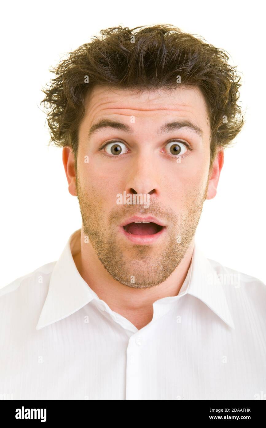 Young man is amazed with wide eyes Stock Photo - Alamy