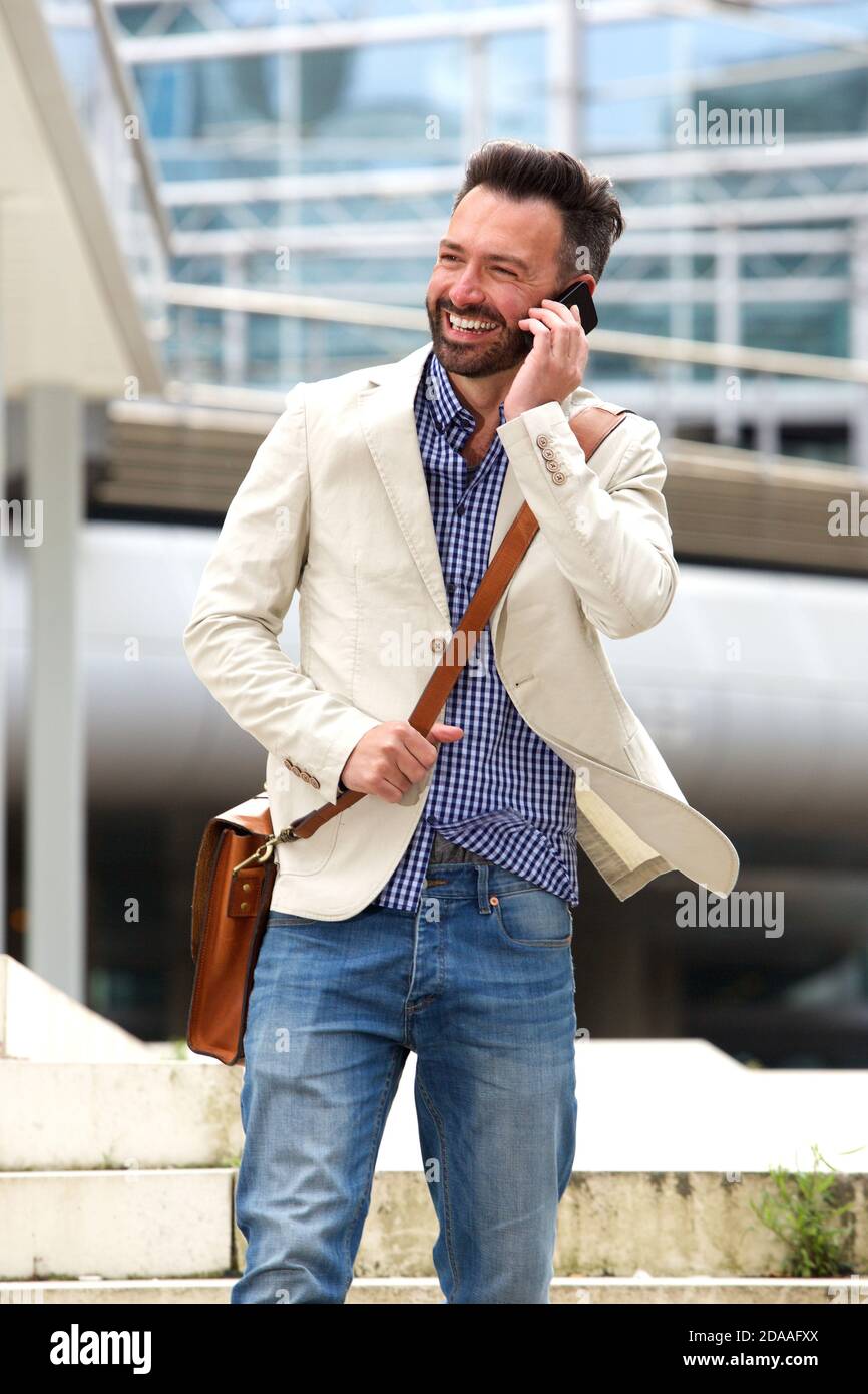 Smart man walking down steps hi-res stock photography and images - Alamy