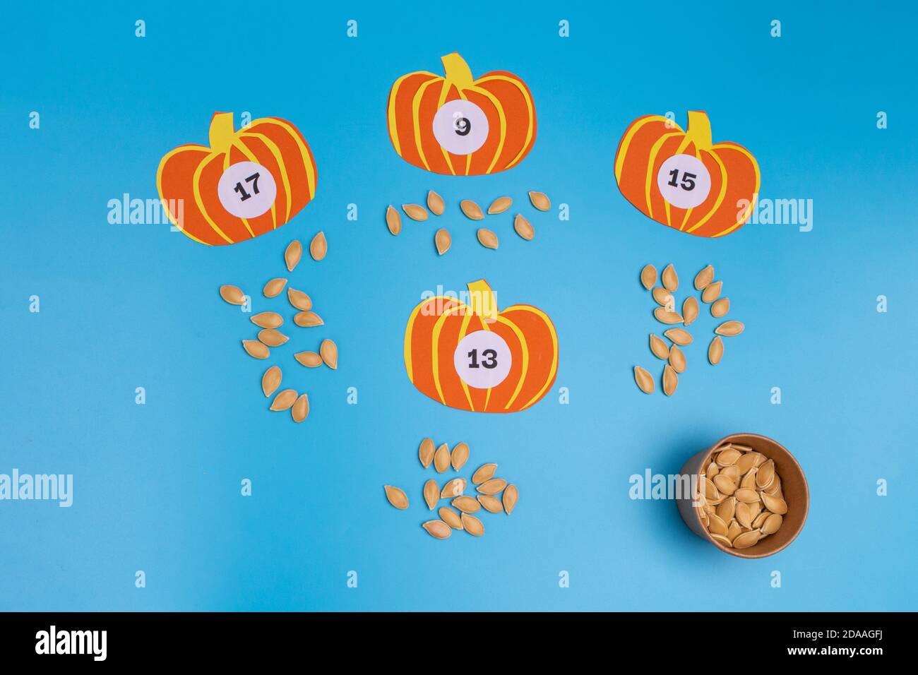 pumpkin character and seeds counting game for kids. Education concept ...