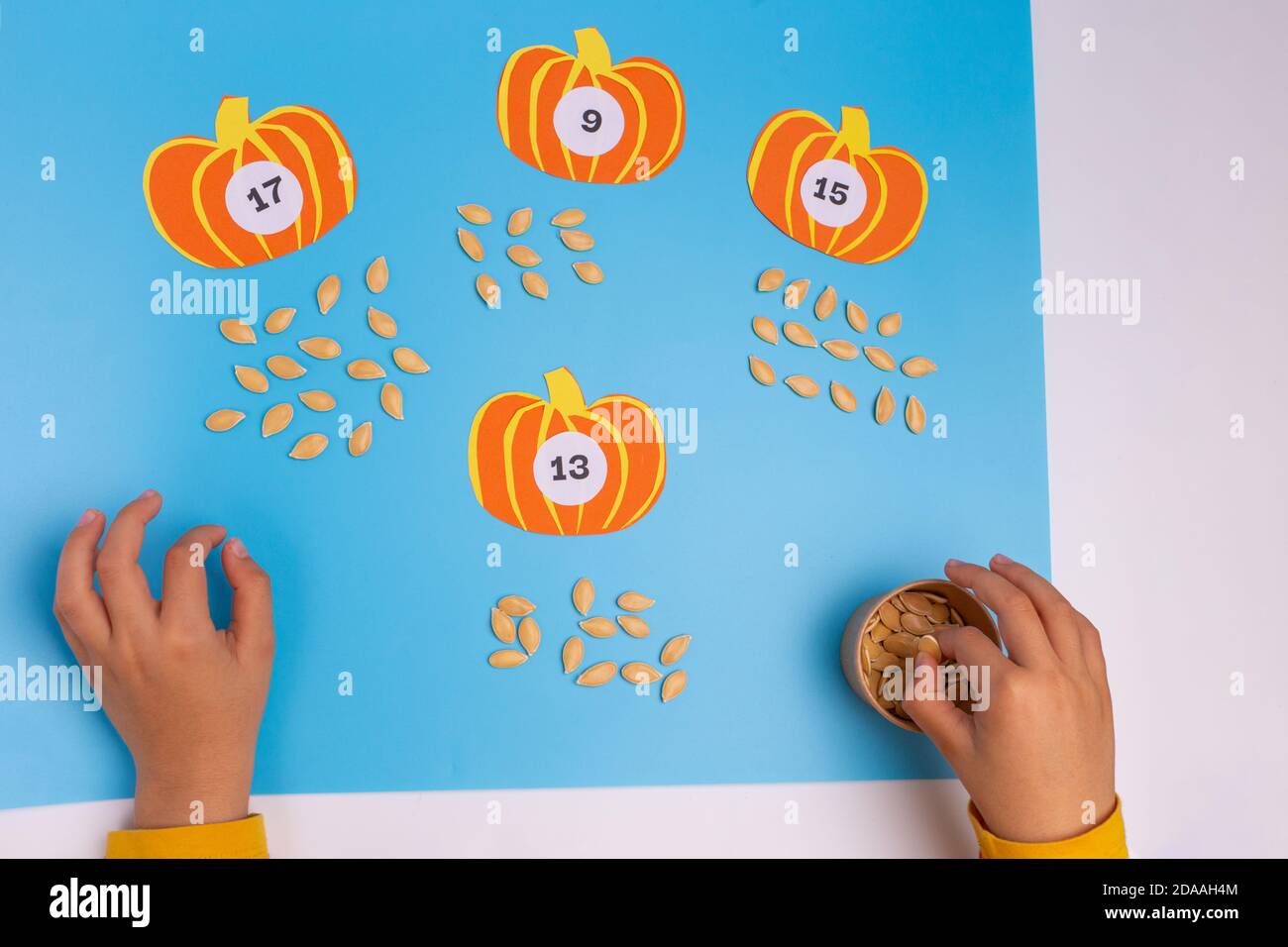 pumpkin seeds counting game for kids. Education concept. preschooler ...