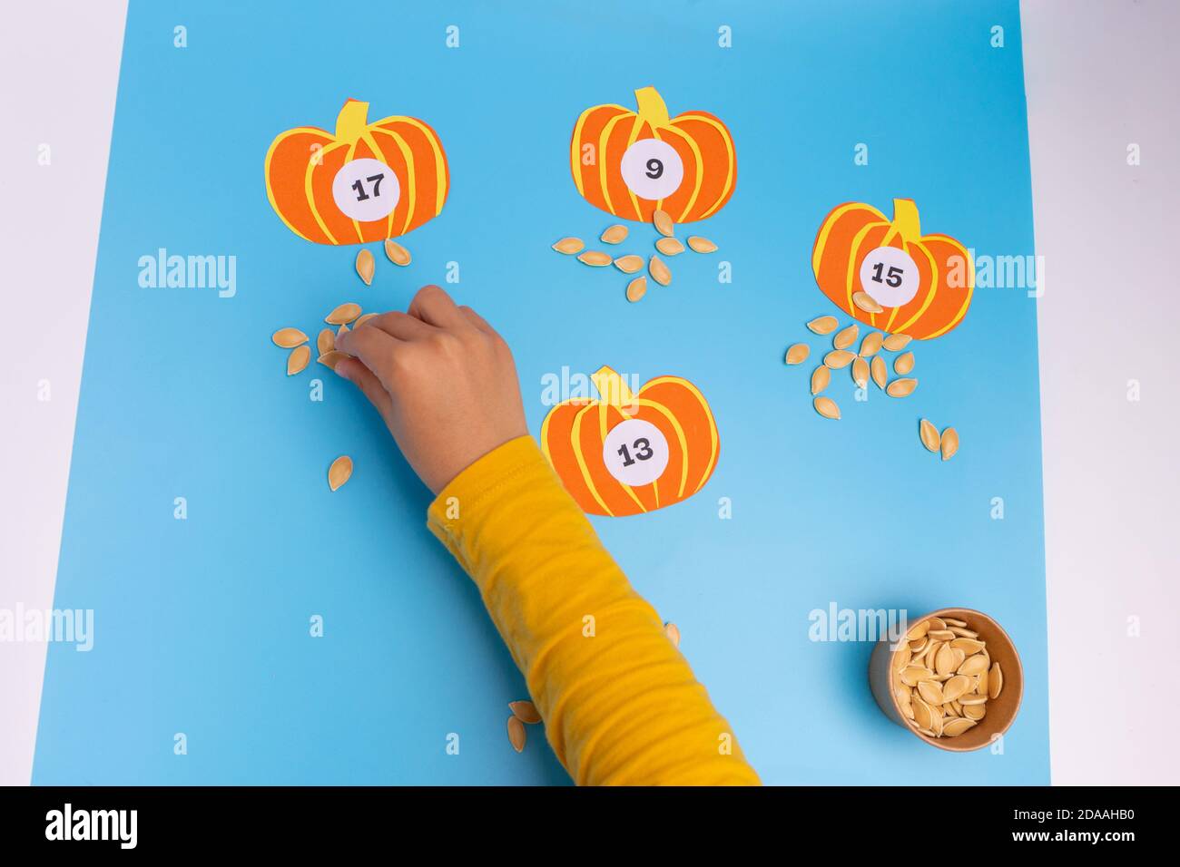 pumpkin seeds counting game for kids. Education concept. preschooler ...