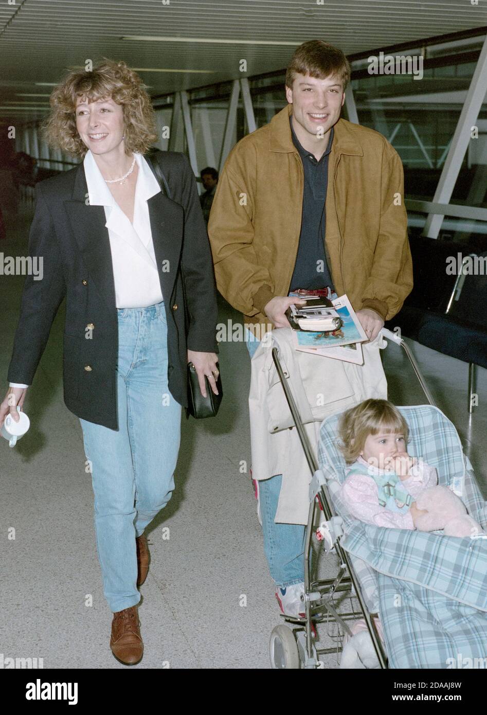Rugby player Rob Andrew wife and daughter at London Heathrow Airport ...