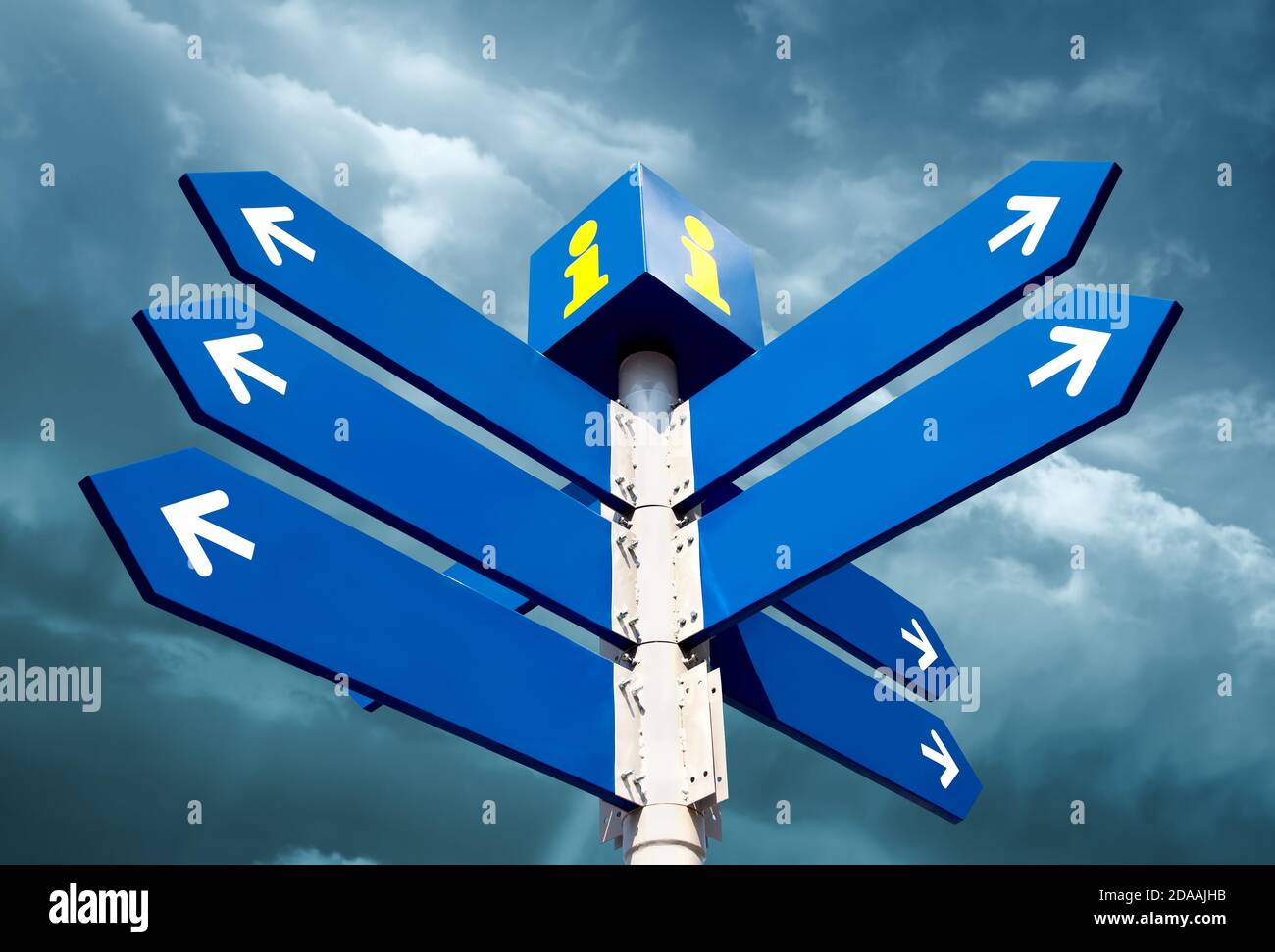 Blank directional road signs over cloudy sky Stock Photo - Alamy
