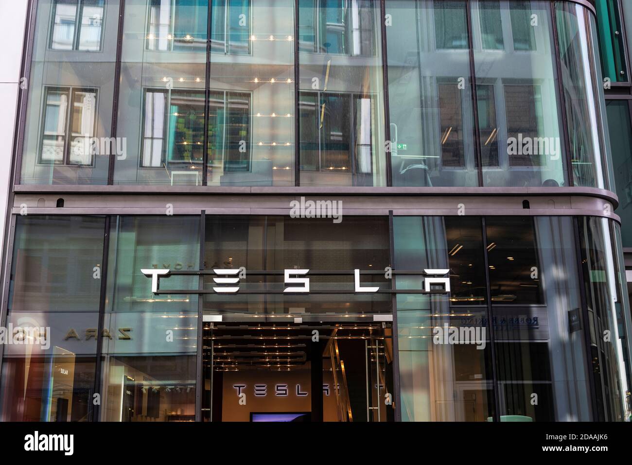 Hamburg, Germany - August 23, 2019: Tesla brand and logo in a facade of ...