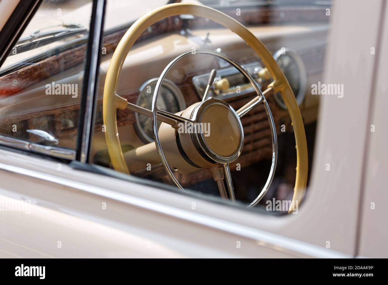 Old cabin, console and steering wheel in a vintage retro car. Retro ...