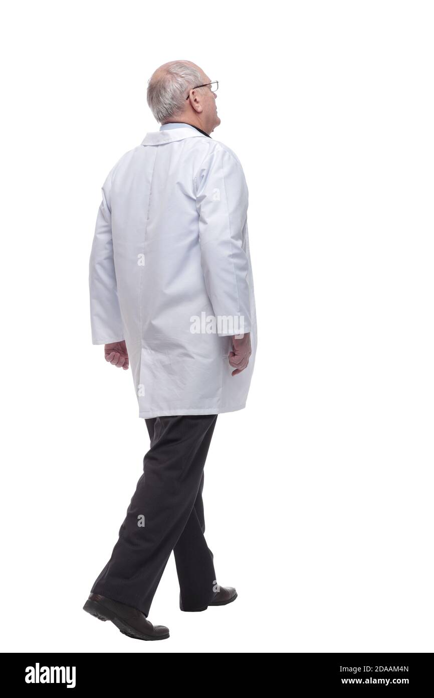 rear view. senior doctor with stethoscope striding forward Stock Photo ...