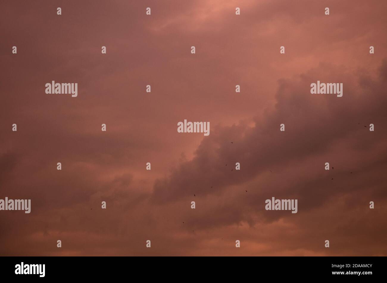 Storm day, dramatic clouds layout wallpaper, red sky Stock Photo - Alamy