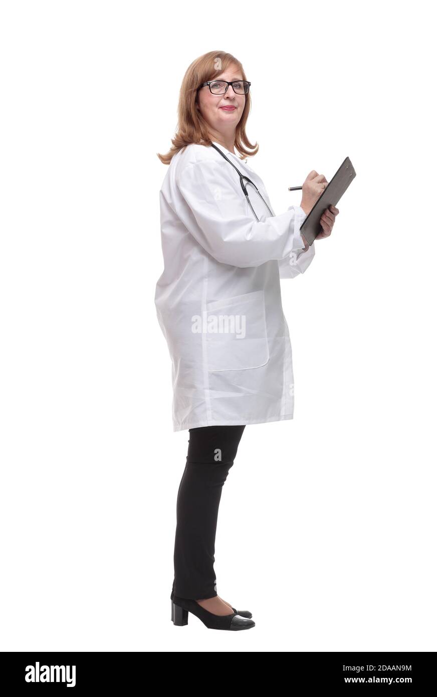 qualified female doctor writing a prescription for a patient Stock ...