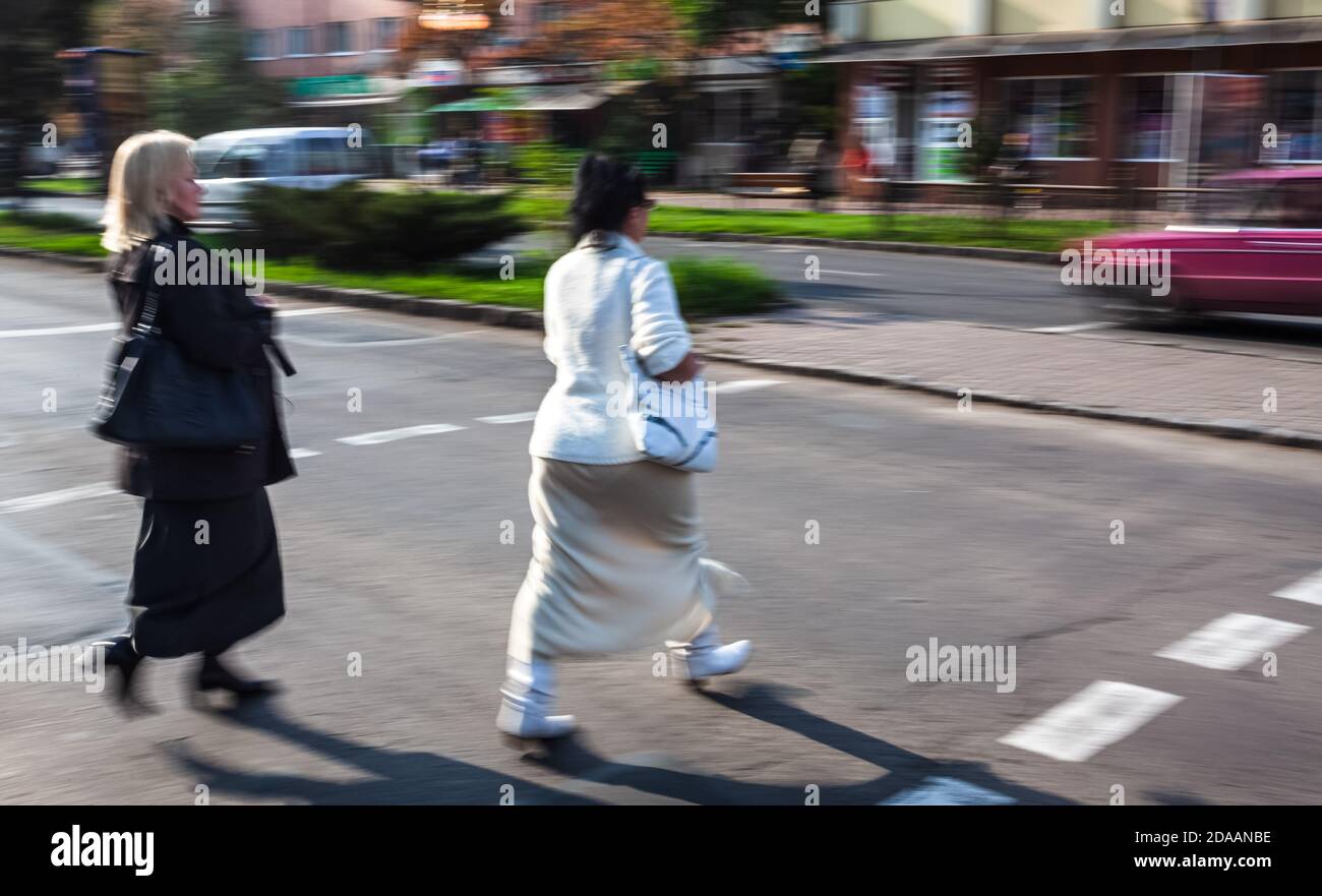 Woman and rushing crowd hi-res stock photography and images - Alamy