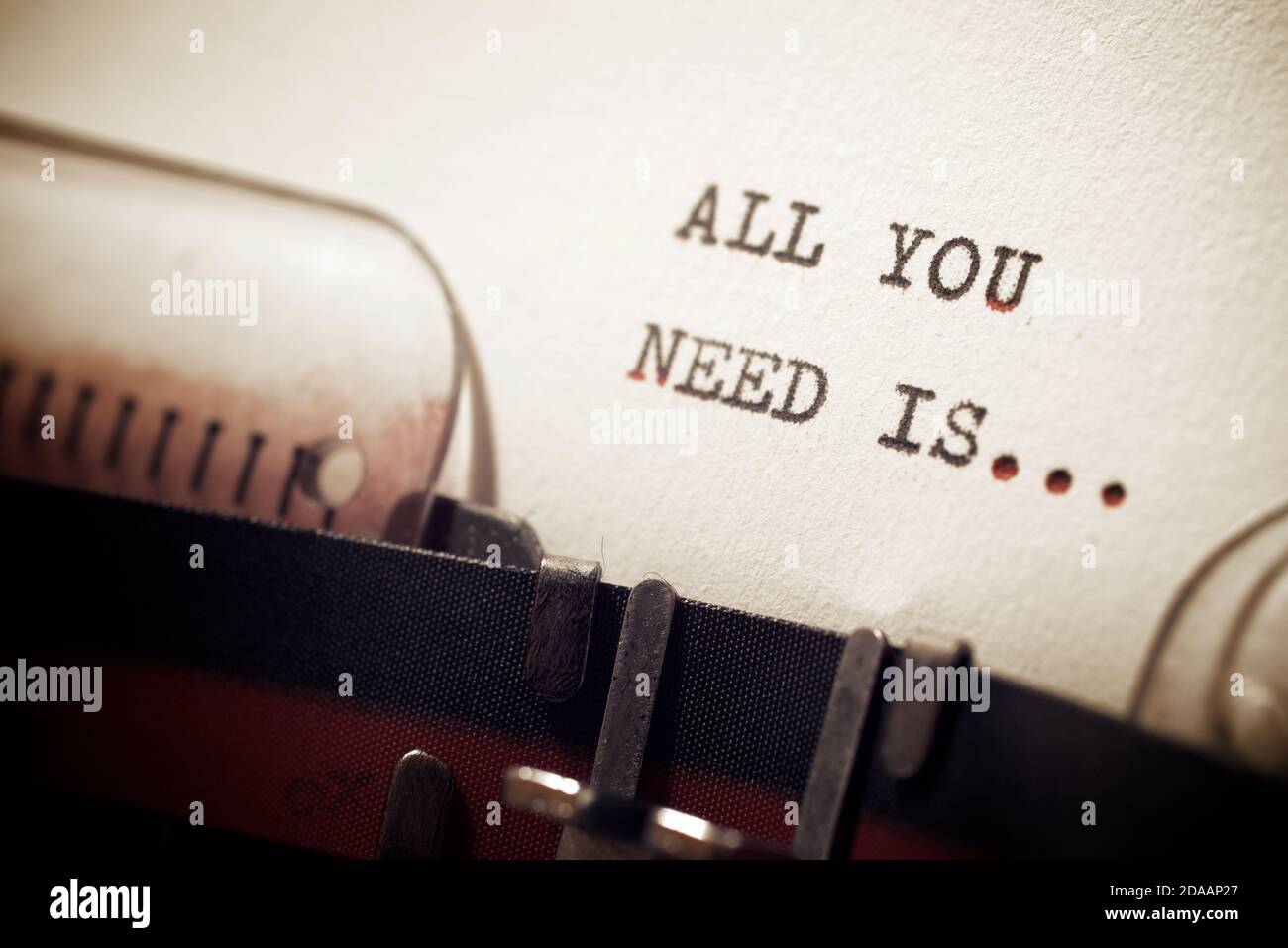 All you need is phrase written with a typewriter Stock Photo - Alamy
