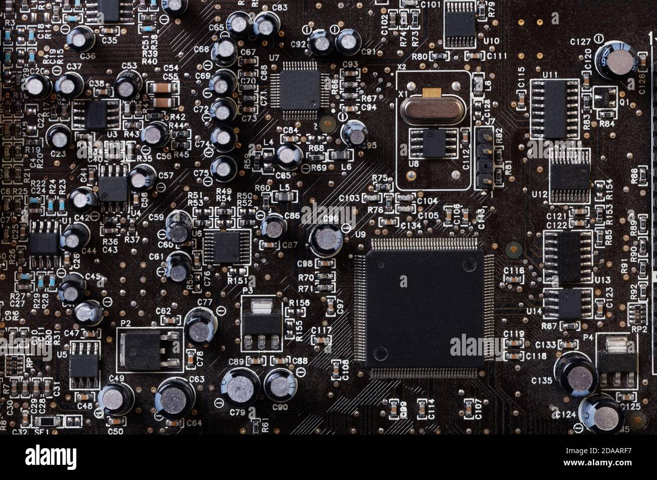 Closeup computers circuit board with various electronic components ...
