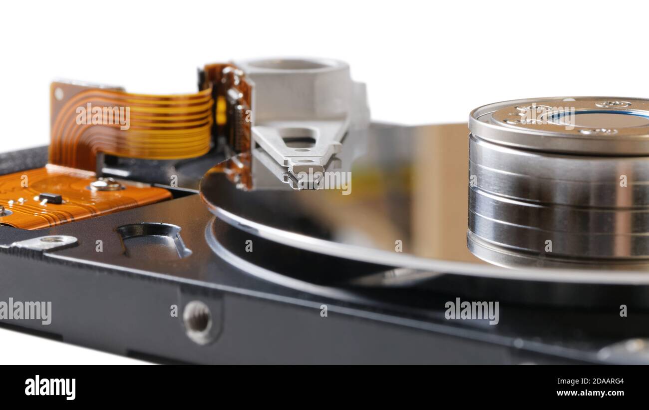 Inside opened hard disk drive (HDD). Isolated on white Stock Photo - Alamy