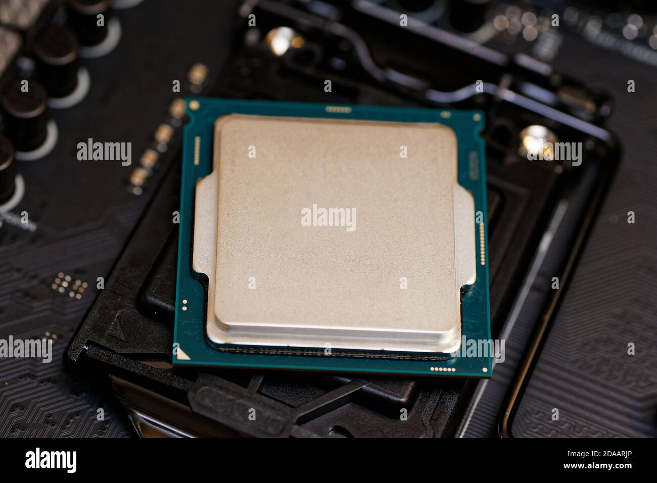 Closeup Central Processor Unit (CPU) ready to install on motherboard ...