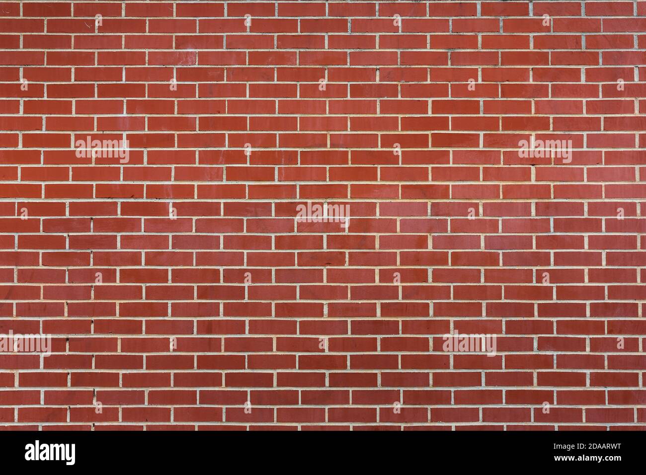 Red brick wall background. Texture of building facades Stock Photo - Alamy