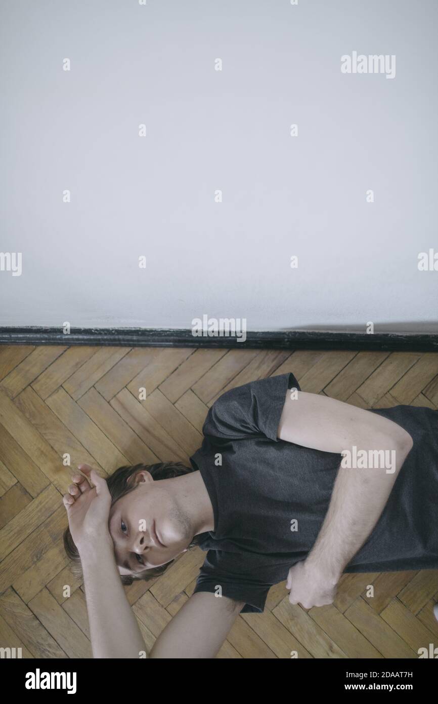 a very lonely guy at home suffers from the fact that he is alone and ...