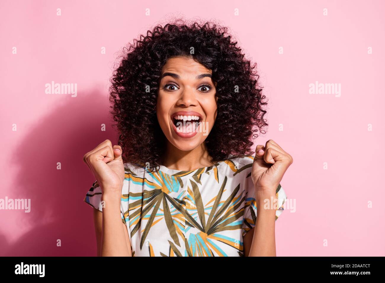 Photo portrait of woman screaming celebrating victory with fists up ...