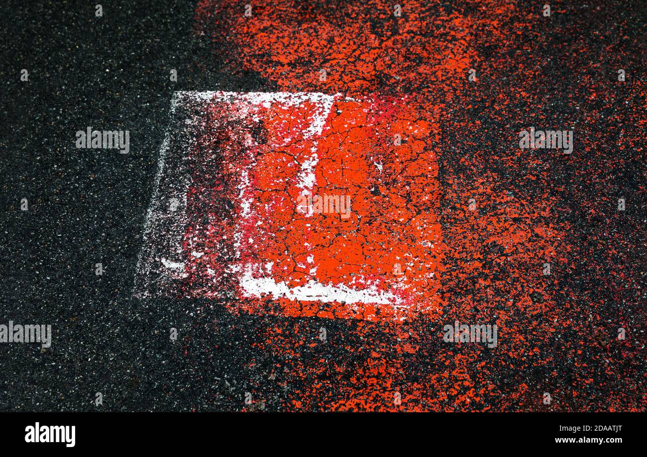 Abstract colorful composition on the asphalt. Abstract sign on asphalt ...