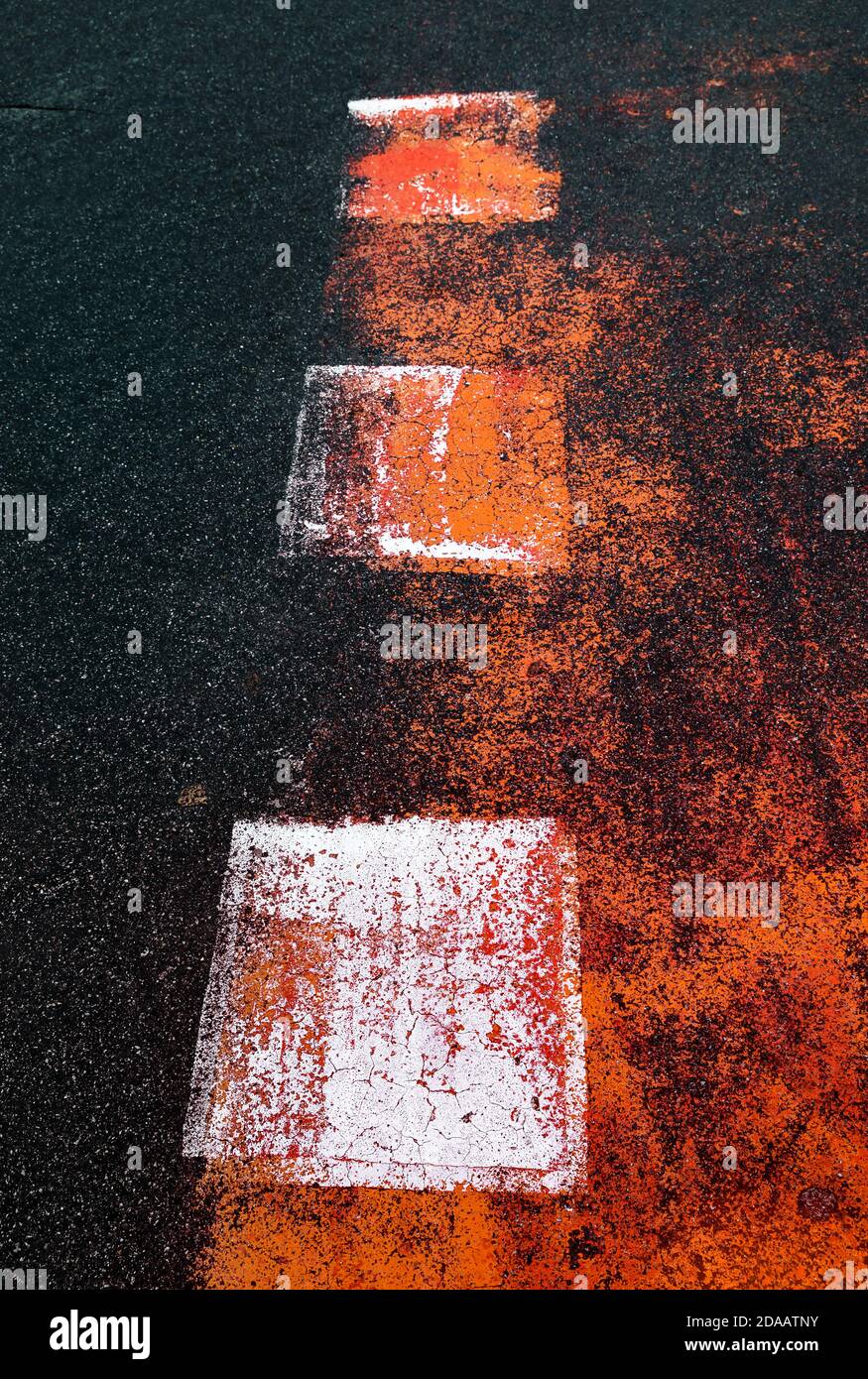 Abstract colorful composition on the asphalt. Abstract sign on asphalt ...
