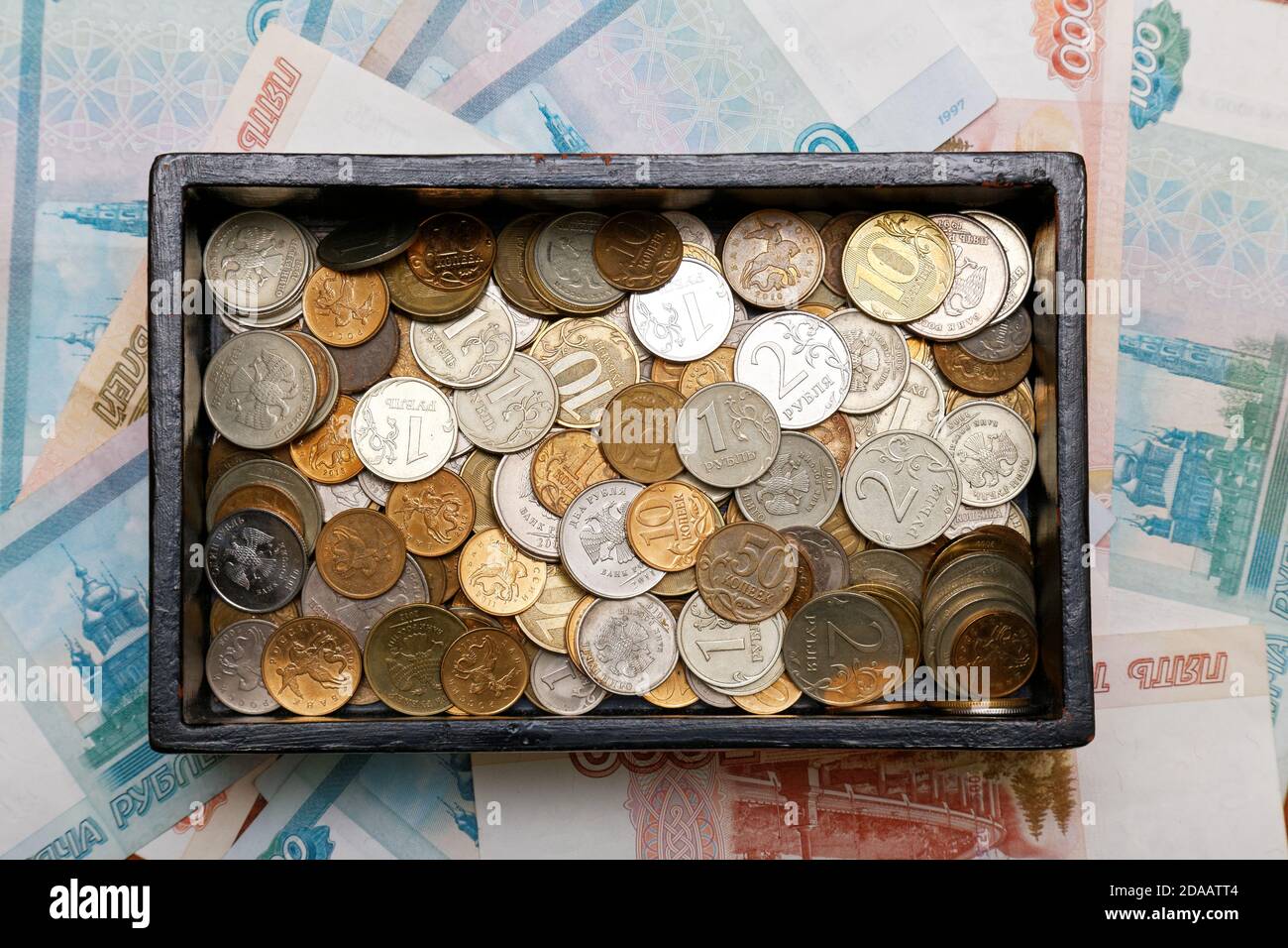 Box with coins hi-res stock photography and images - Alamy