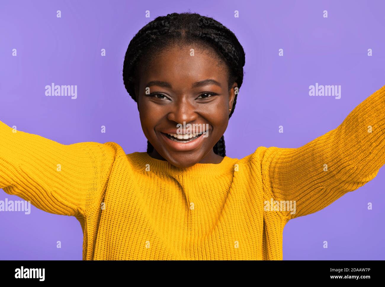 Joyful african american woman taking selfie, capturing self-portrait ...