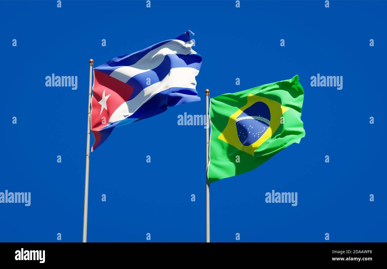 Beautiful national state flags of Brasil and Cuba together at the sky ...