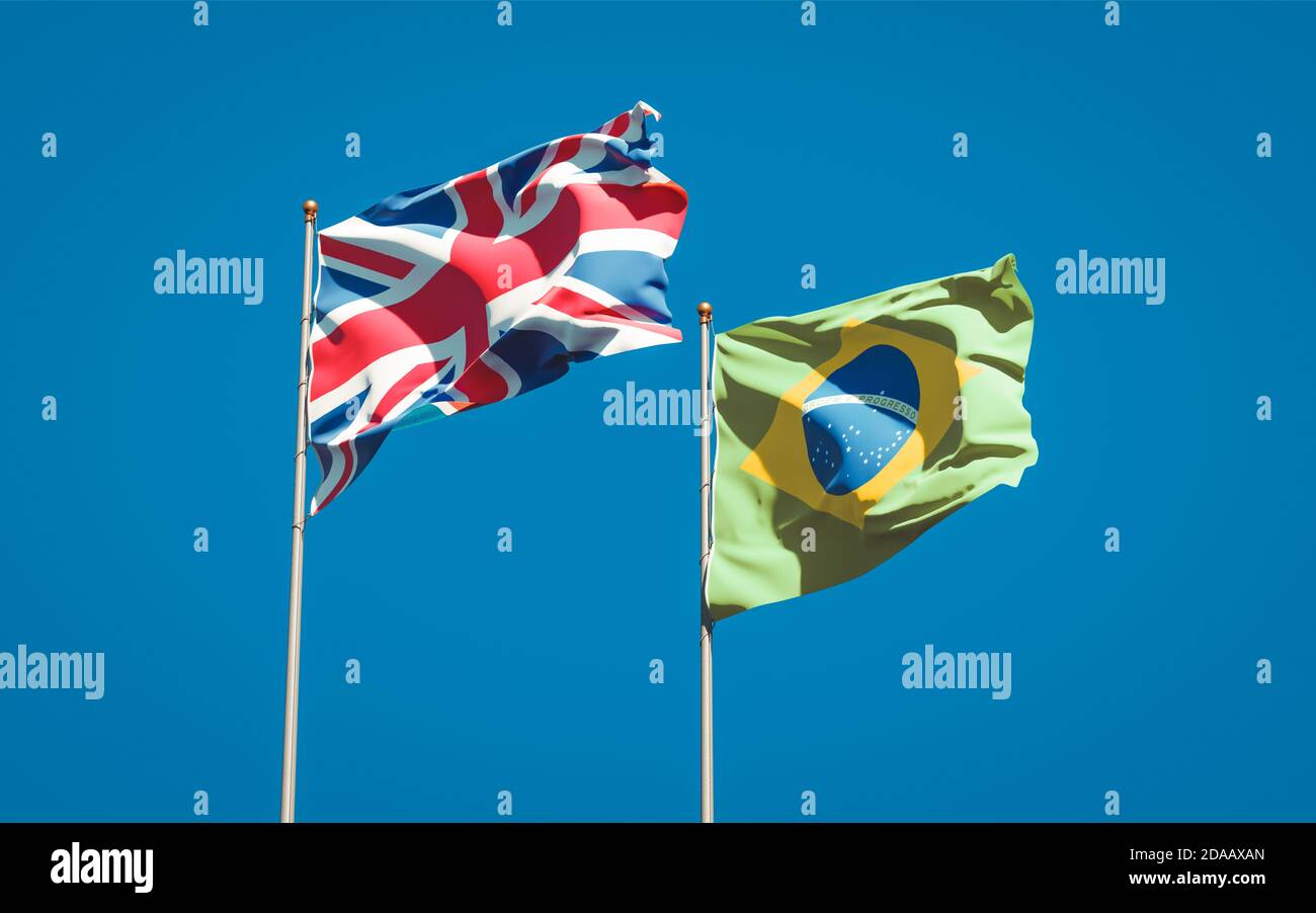 Beautiful national state flags of UK and Brasil together at the sky ...