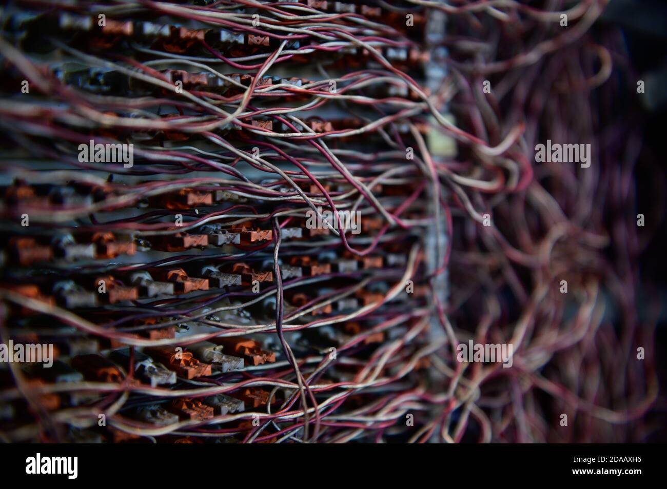 Messy telephone switchboard wire in box Stock Photo - Alamy