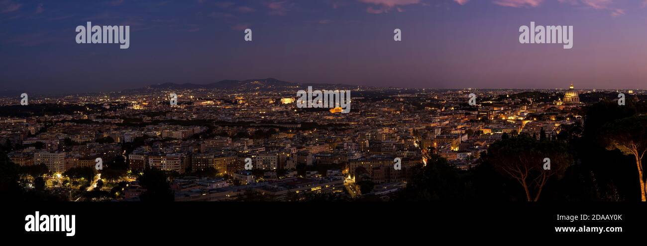 panoramic view of Rome from Monte Mario hill at dusk with the Roman ...