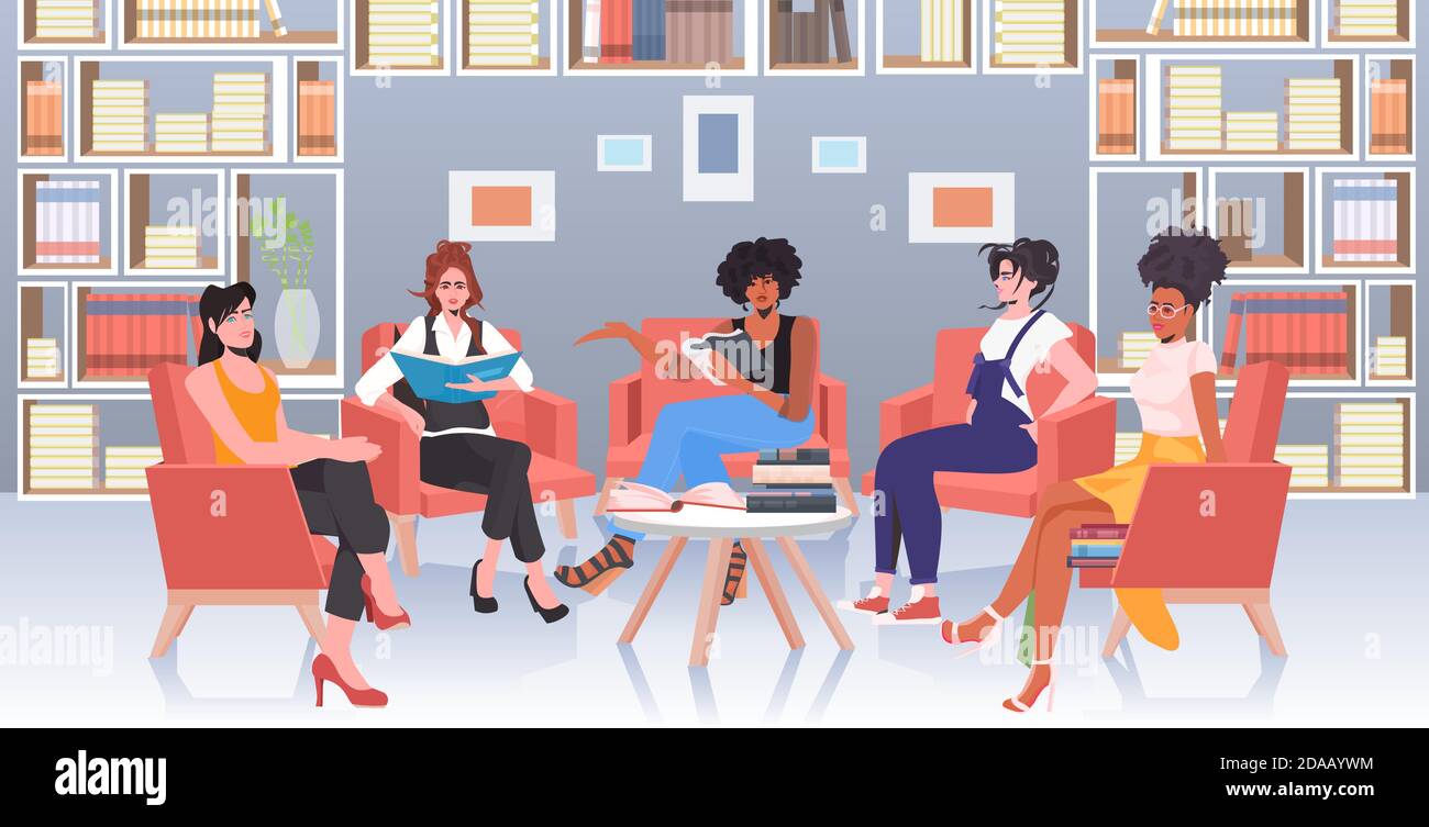 mix race women discussing during meeting in conference area female ...