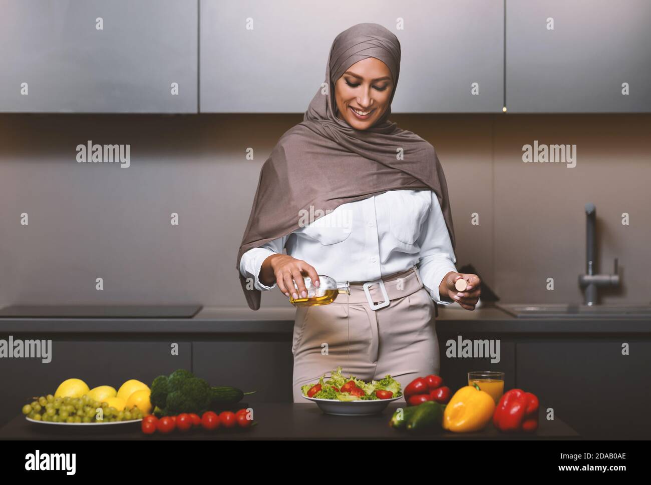Arab Wife Cooking Making Fresh Vegetable Salad Standing In Kitchen ...