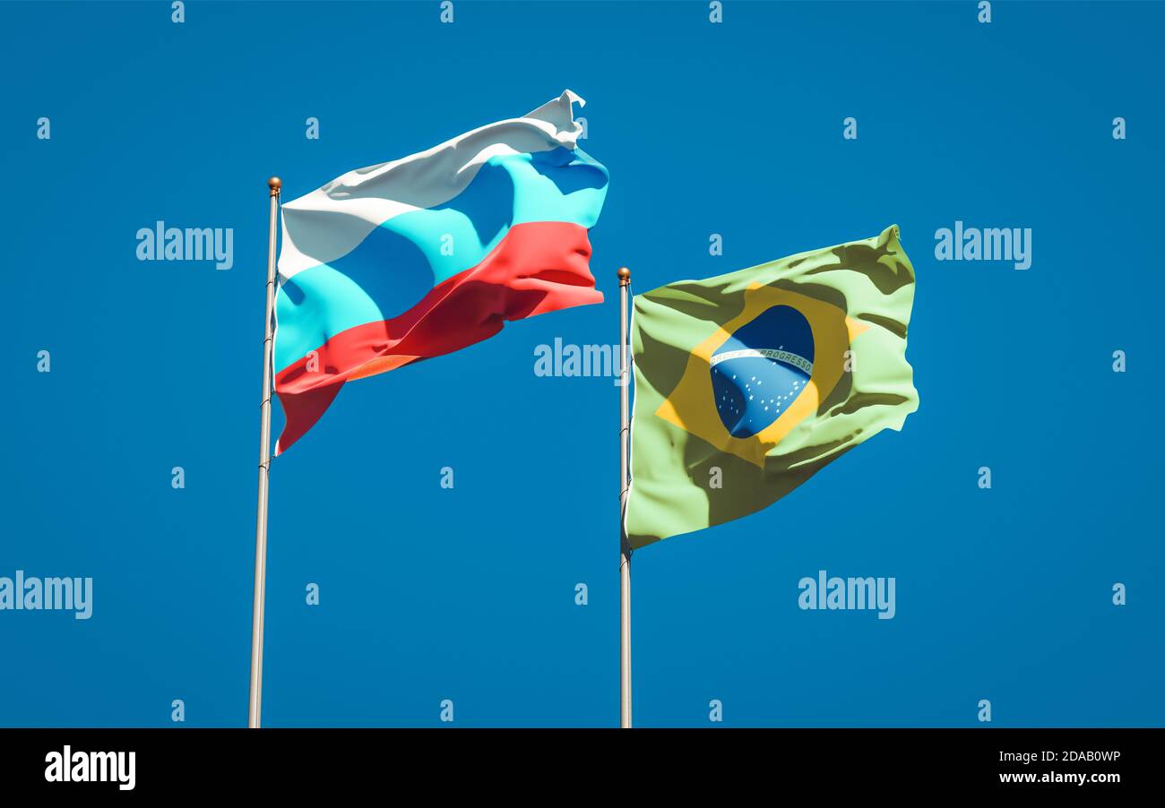 Beautiful national state flags of New Russia and Brasil together at the ...