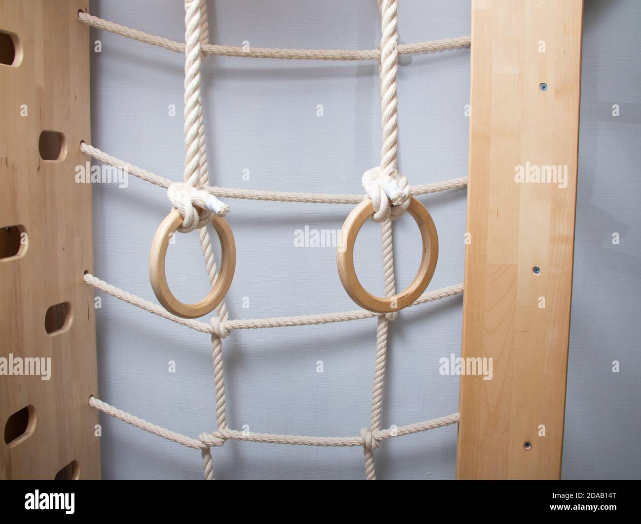 Swedish wall with rings and a wall for climbing in the children 's room ...