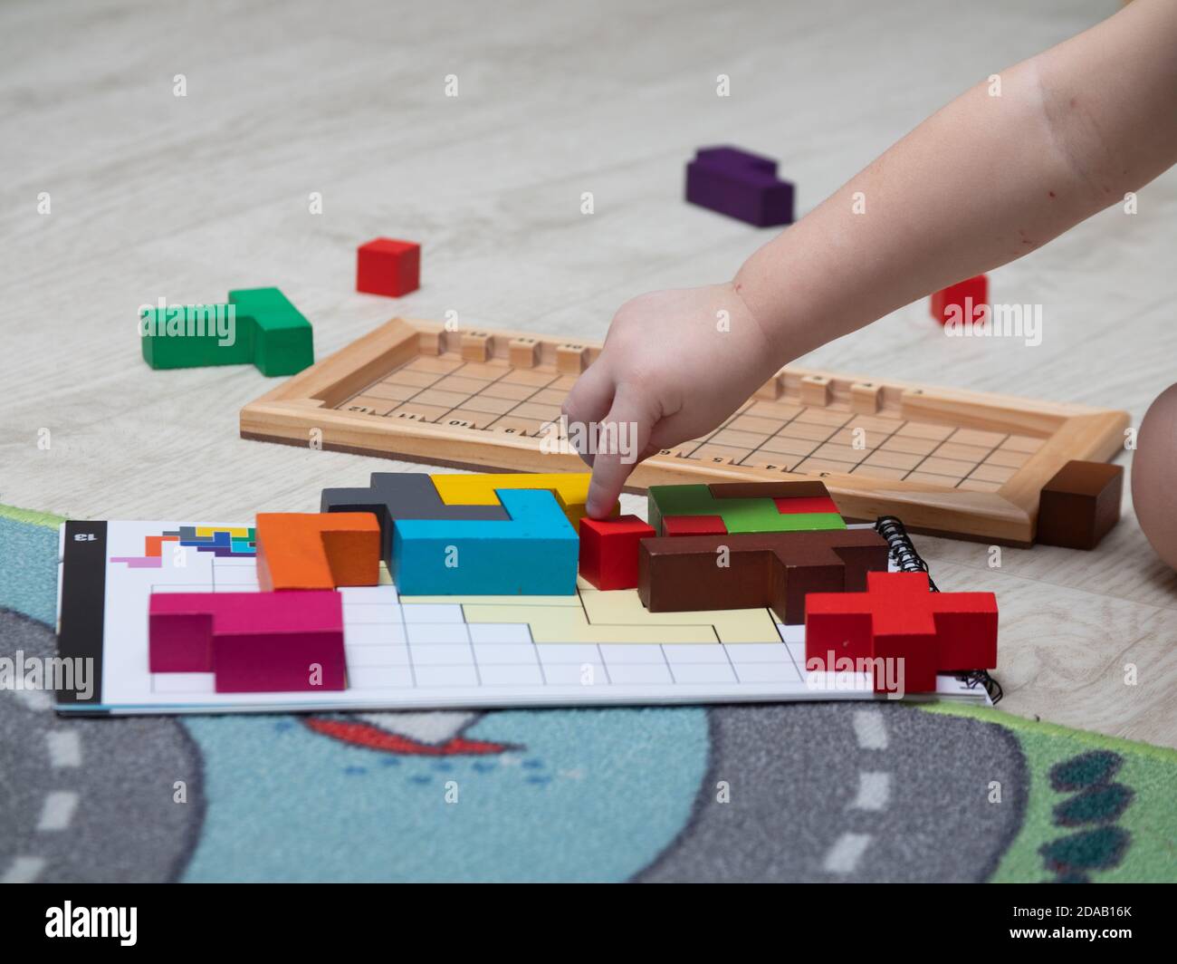 Children play a Board game. Educational games for children. the ...