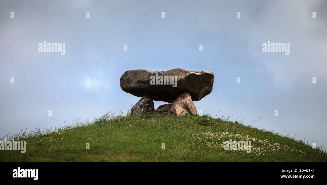 Big stones structure on top of a hill covered with grass. Japanese ...