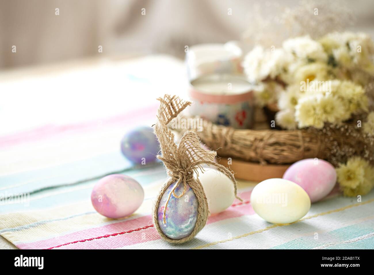Easter composition with festive eggs on blurred background close up ...
