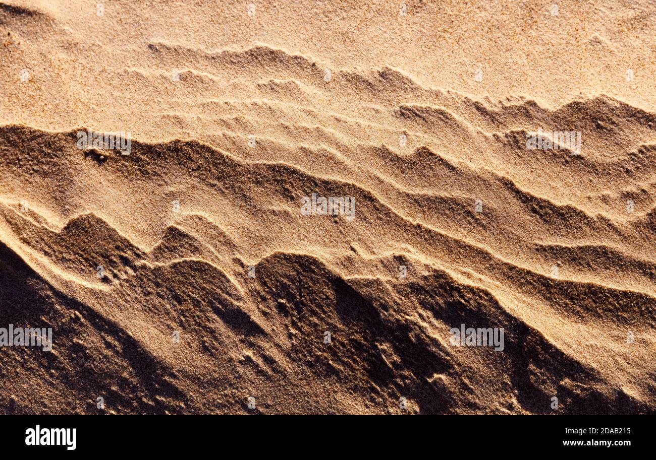 Dunes on the sea shore. Ripples in wet sand background texture. Beach ...