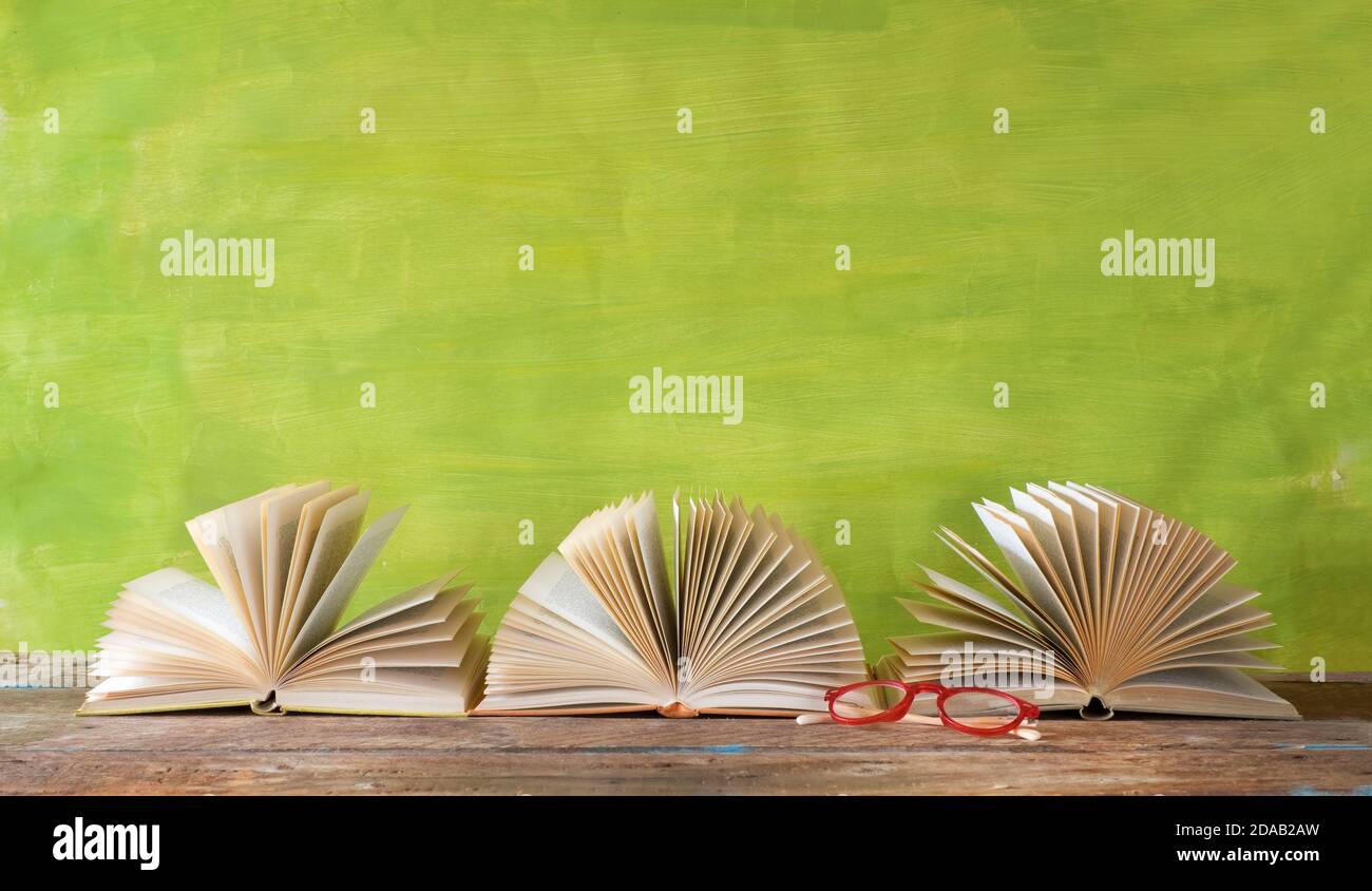 Opened books in a row. Reading,literature,education,library,home office ...