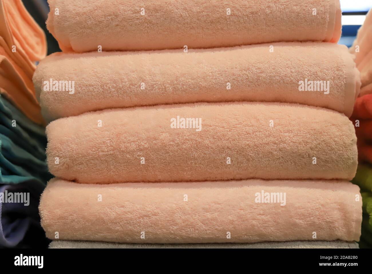 A stack of terry towels lies on a shelf in the bathroom, wardrobe ...