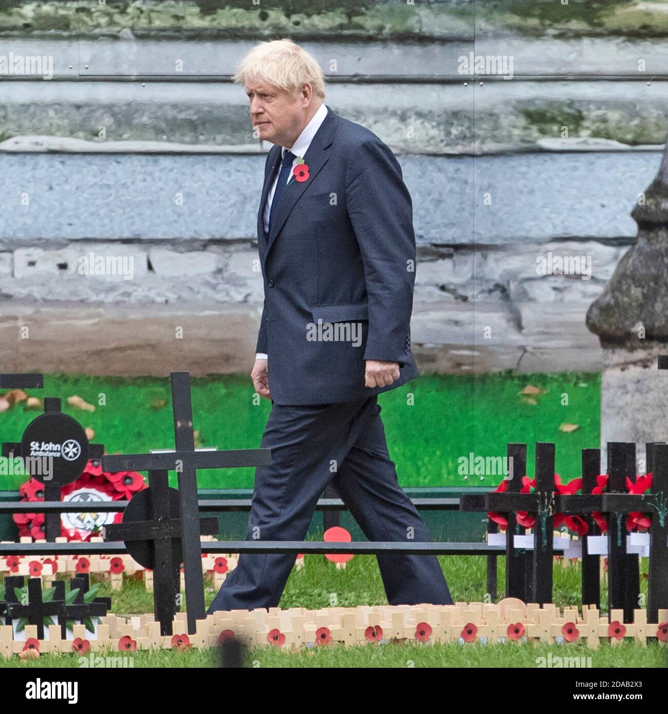 Prime Minister Boris Johnson walks from Westminster Abbey to face Sir ...
