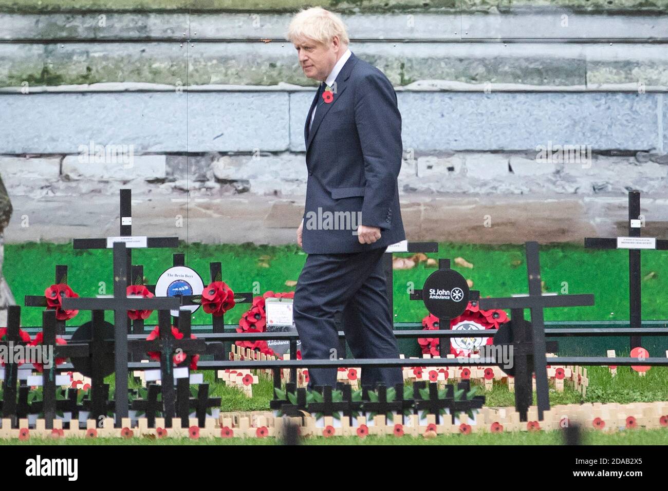 Prime Minister Boris Johnson walks from Westminster Abbey to face Sir ...