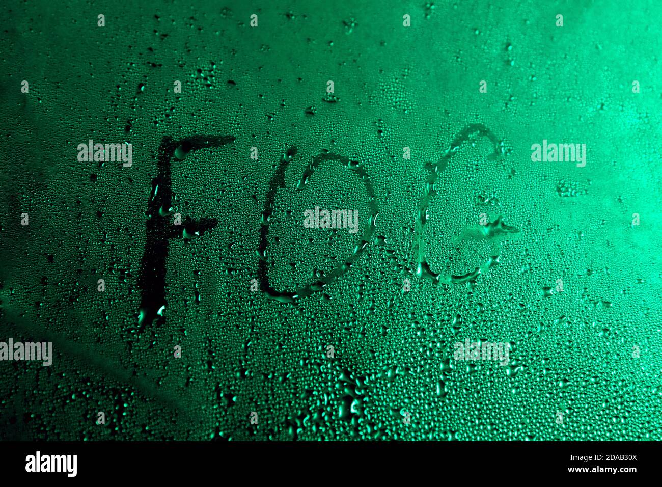 The word fog written on the wet glass Stock Photo - Alamy