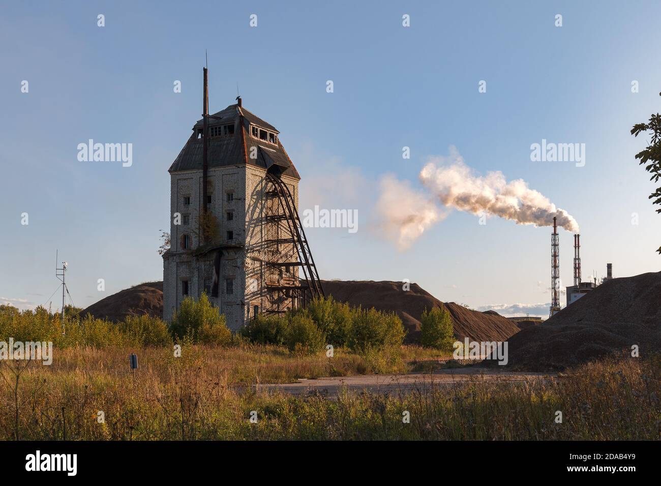 Smoking pipes of old chemical plant, Estonia Stock Photo - Alamy