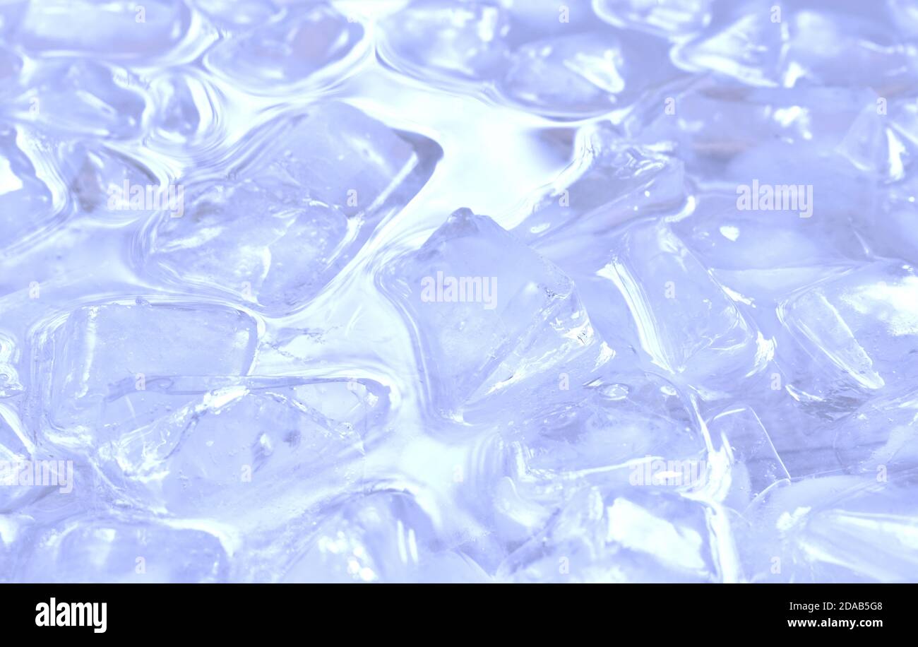 ice cube floating on water in plastic tray Stock Photo - Alamy