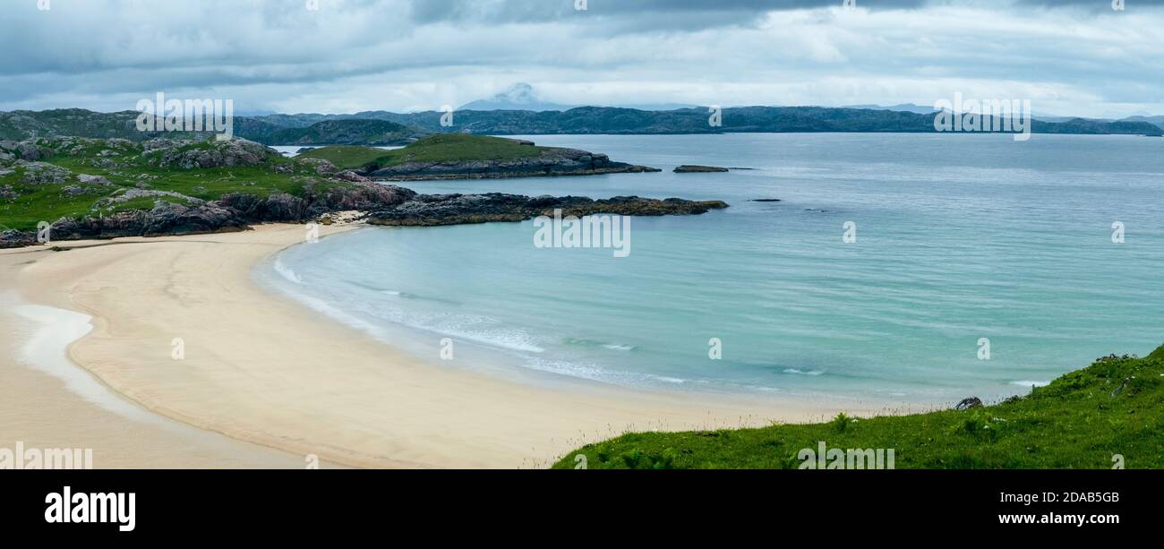A view of Polin Beach, with Ben Stack on the horizon shrouded in clouds ...