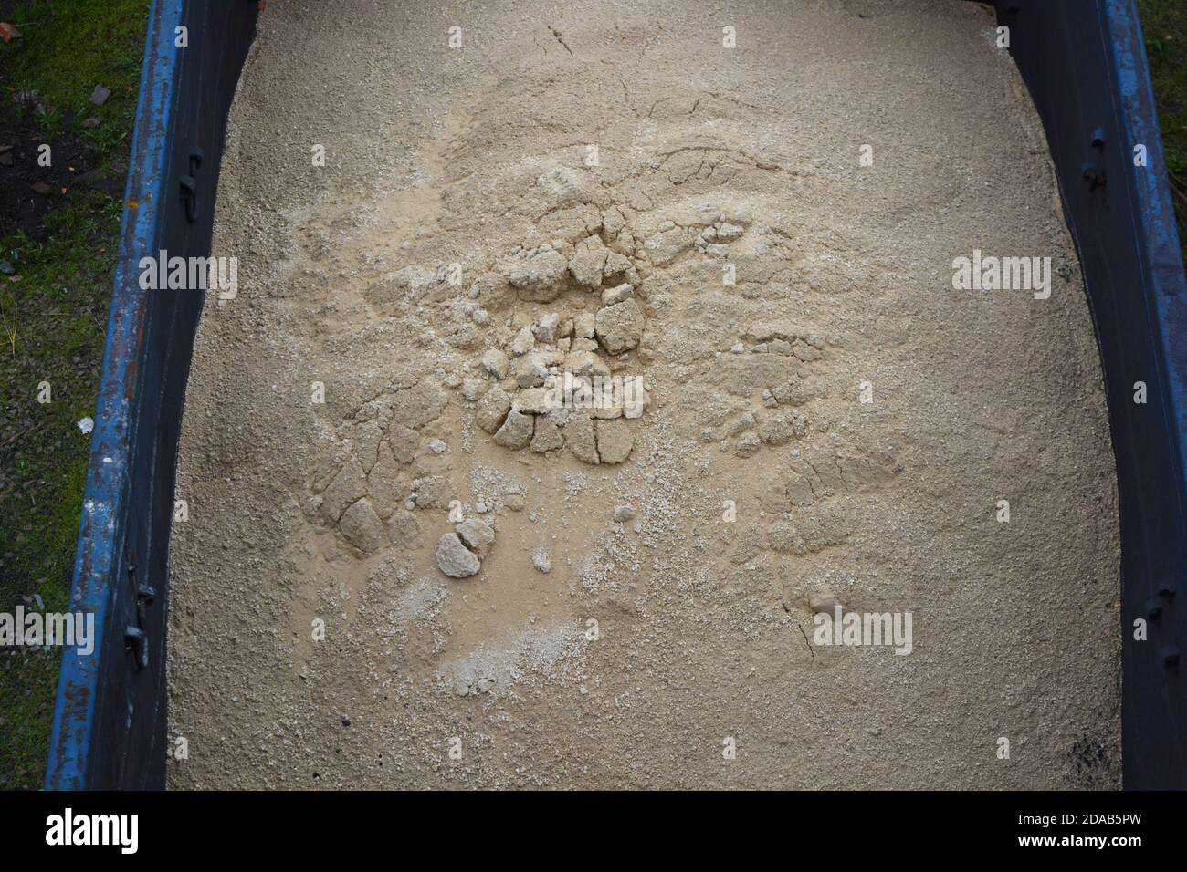 Light clean sieved yellow sand is housed in a metal freight car Stock ...