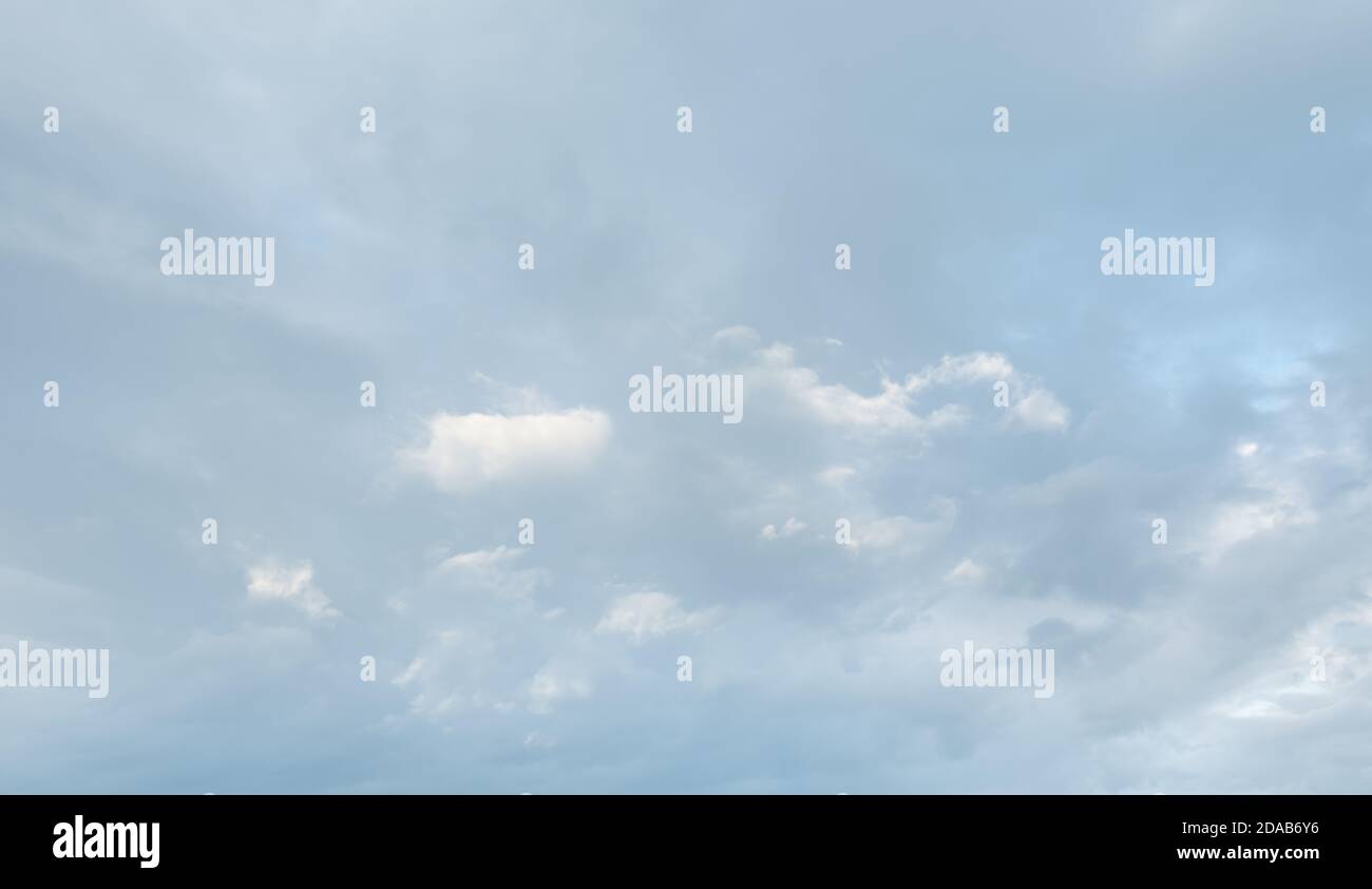 Blurred abstract natural background with clouds in light blue tonality ...